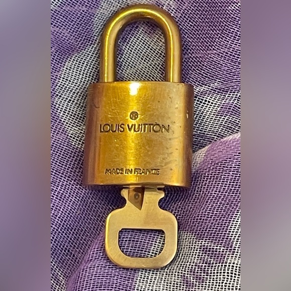 Louis Vuitton | Bags | Louis Vuitton Luxurious Gold Authentic Lock 34 ...